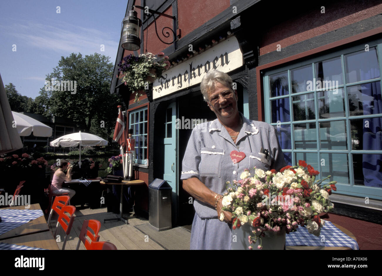 Denmark, Copenhagen. Tivoli Cafe hostess Stock Photo - Alamy
