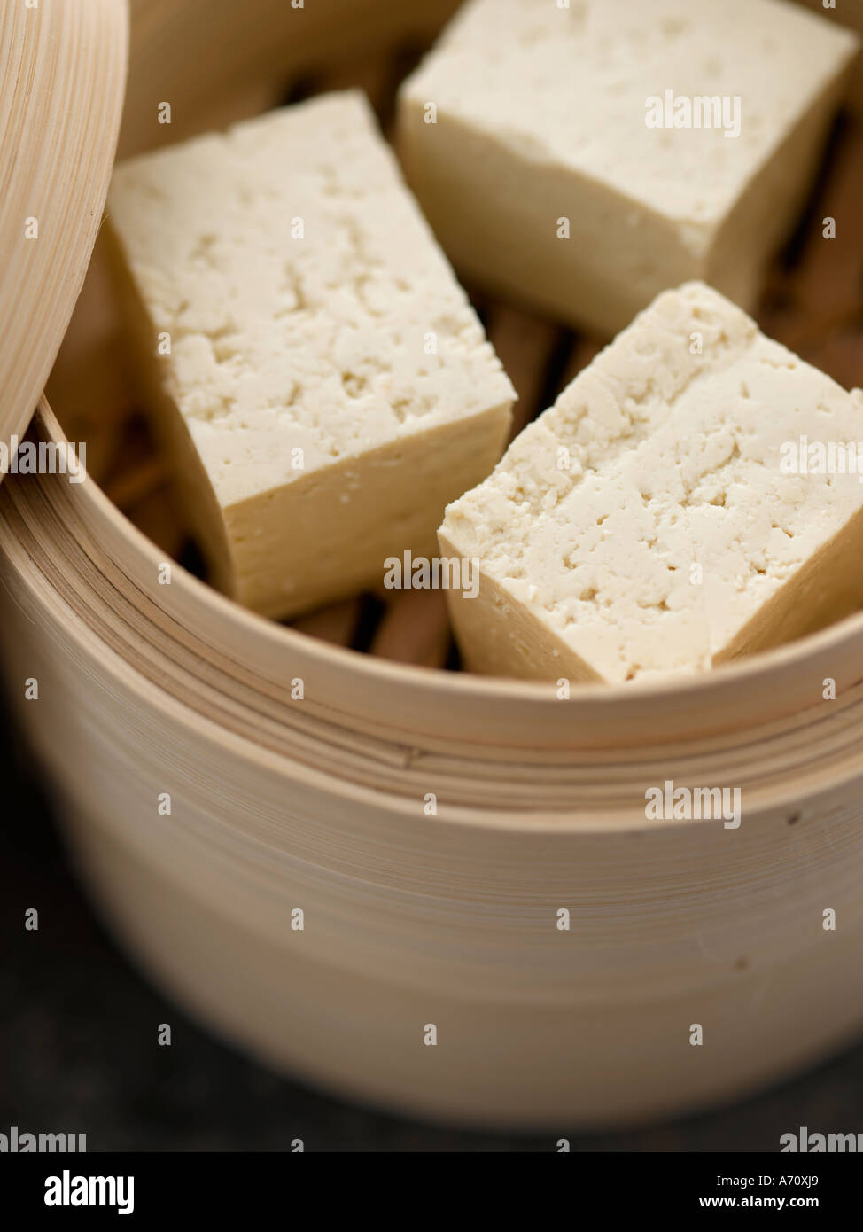 Tofu in bamboo steamer on black background - high end Hasselblad 61mb ...