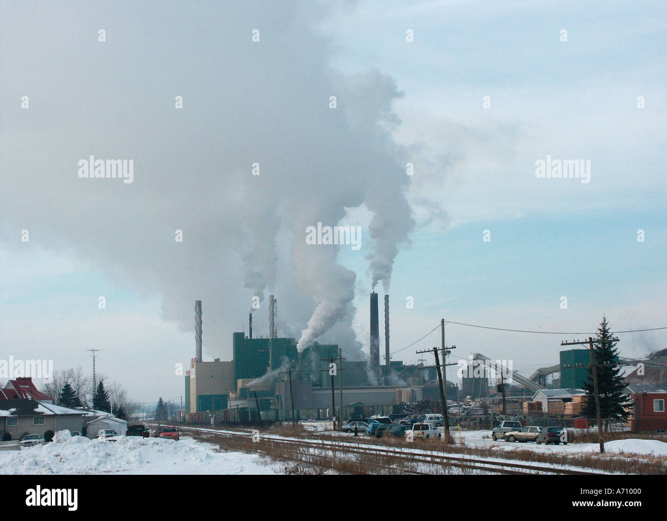 Smoke coming out of a factory Stock Photo - Alamy