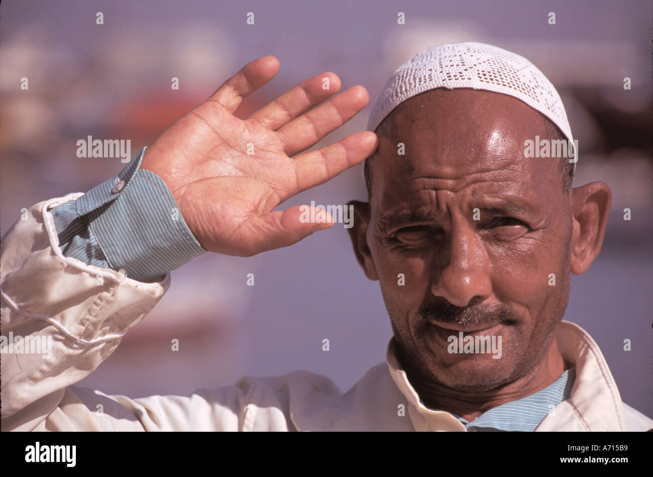 Egyptian man gives a salute in Alexandria, Egypt Stock Photo - Alamy