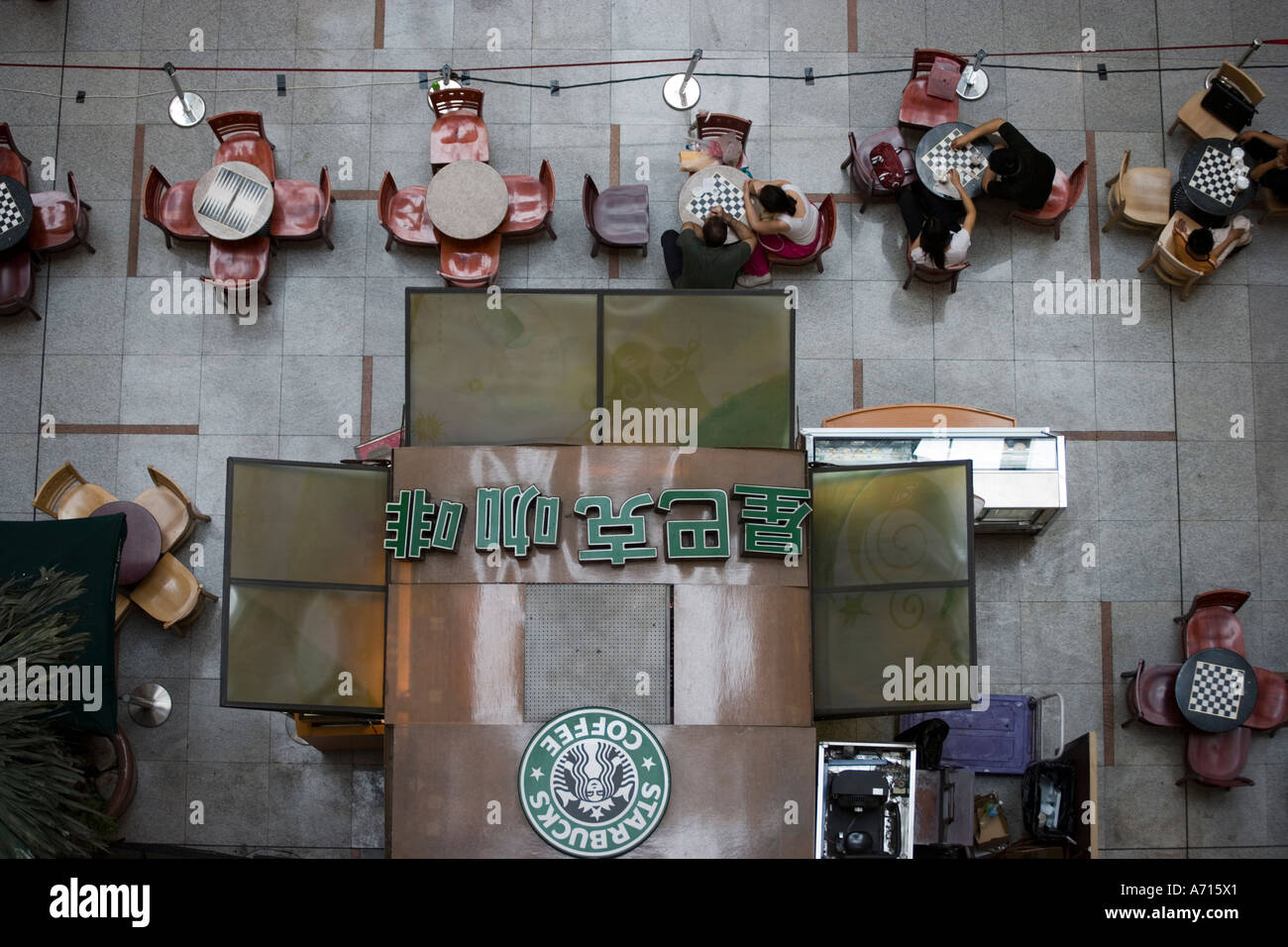 Asia China Beijing Overhead view of Starbucks Coffee cafe inside Dong ...