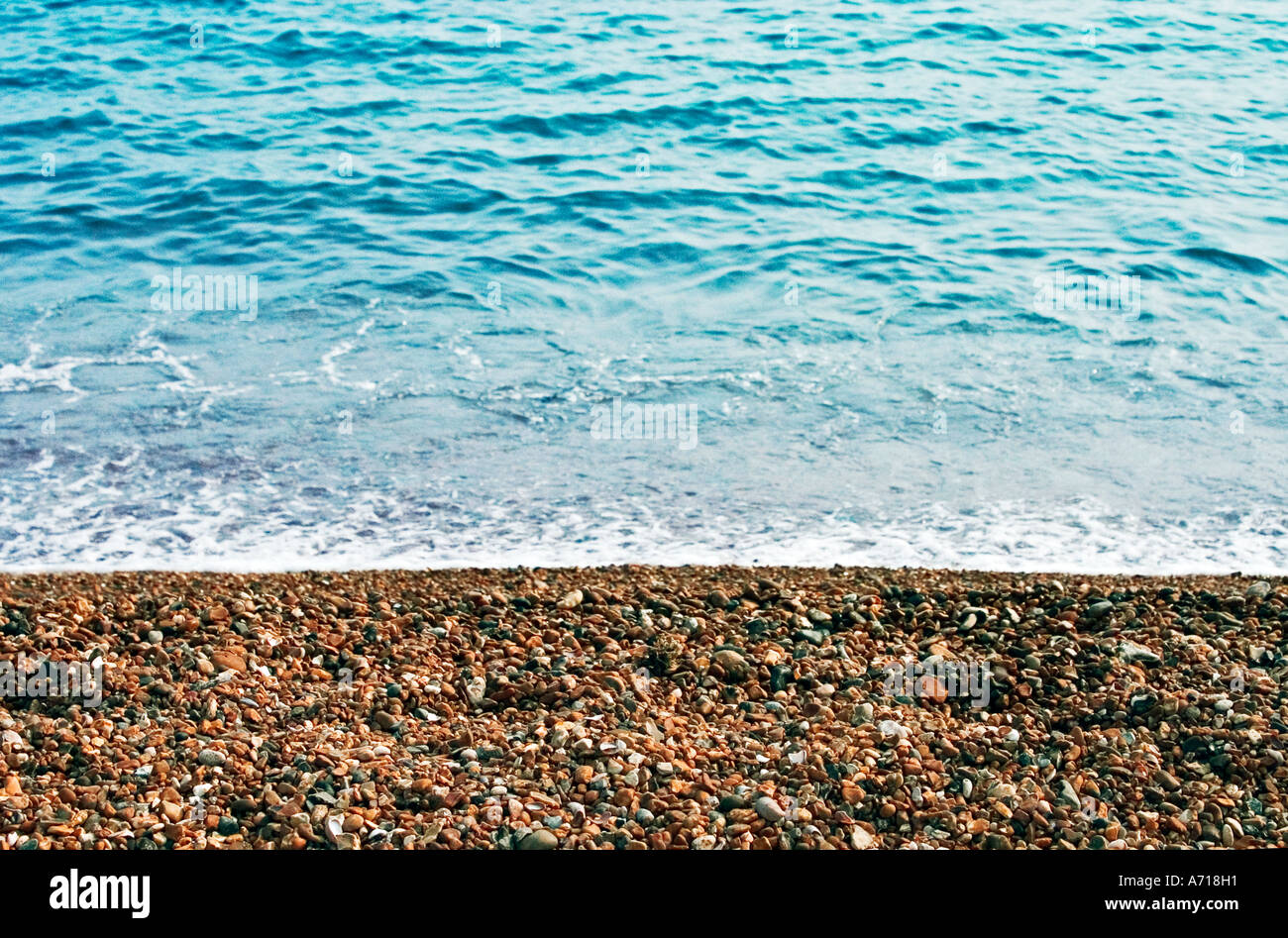 Pebbles shingle beach waves shot hi-res stock photography and images ...