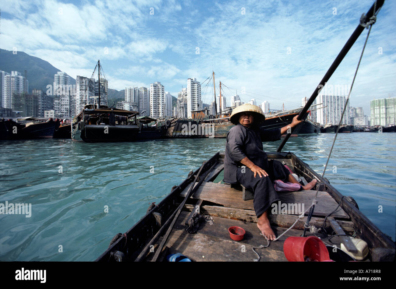 China Hong Kong Woman pilots small junk in Aberdeen Harbour Stock Photo ...