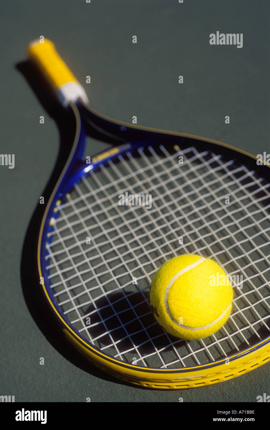 Tennis racket and ball Stock Photo - Alamy