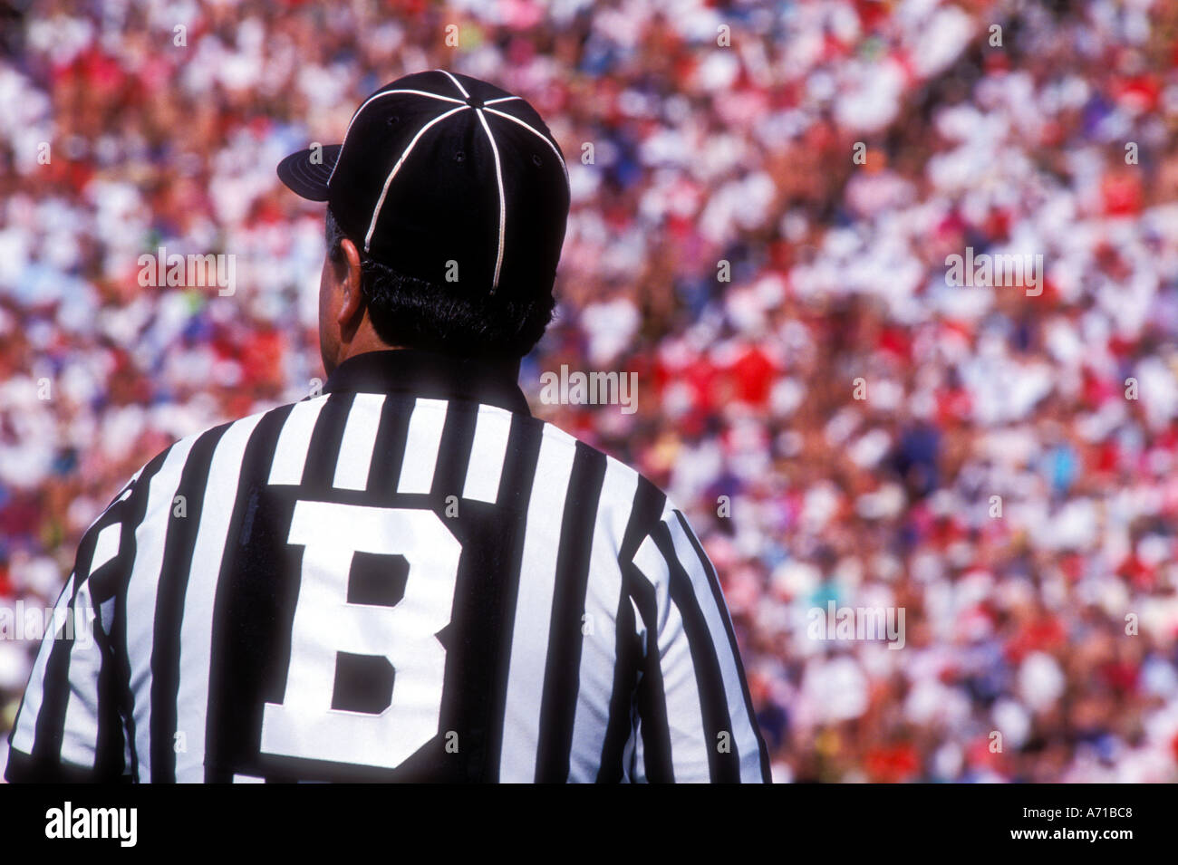 View of football referee from behind Stock Photo - Alamy