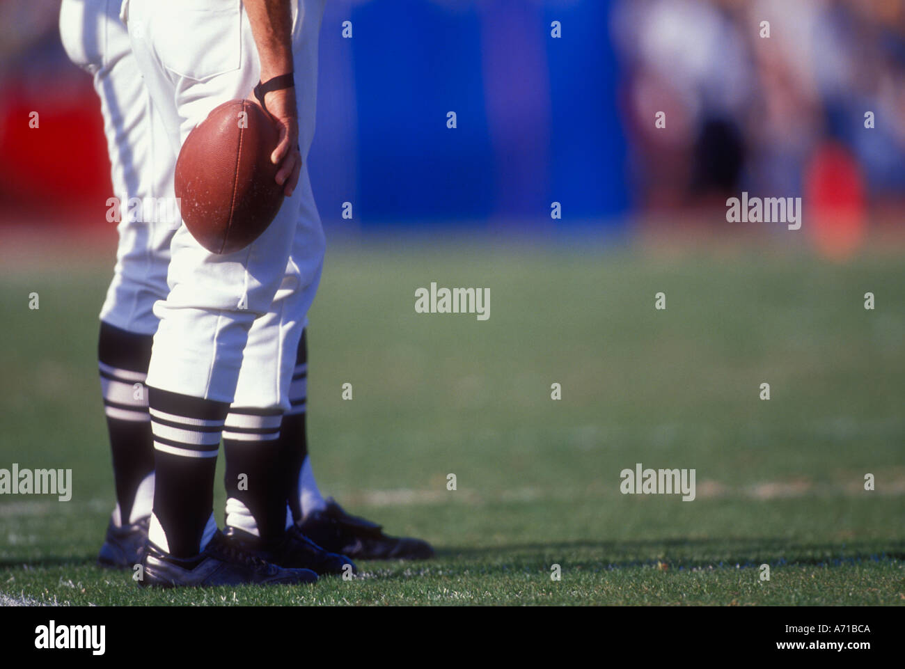 Football referee holding ball Stock Photo - Alamy