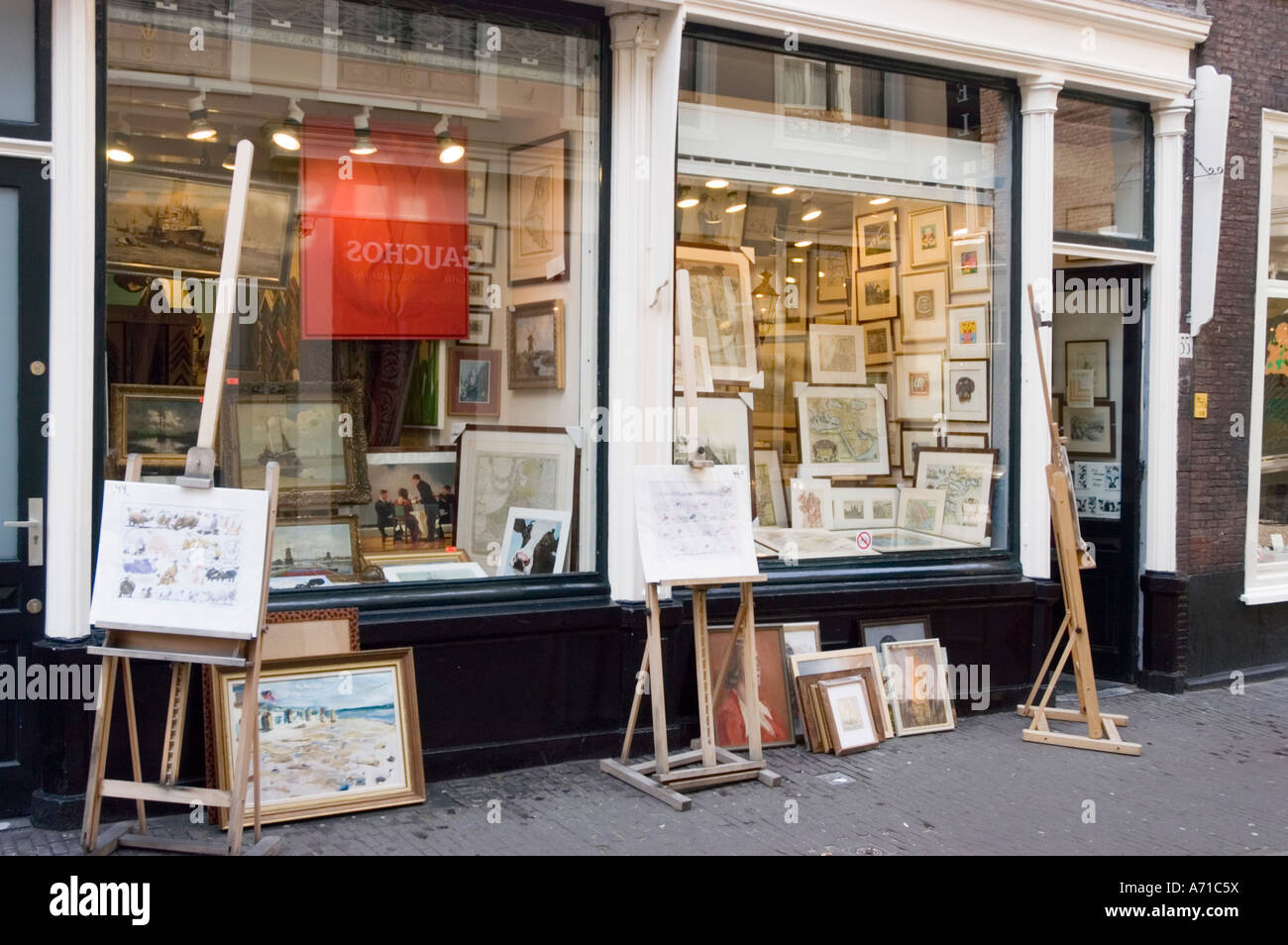 Landscape paintings in storefront hi-res stock photography and images ...