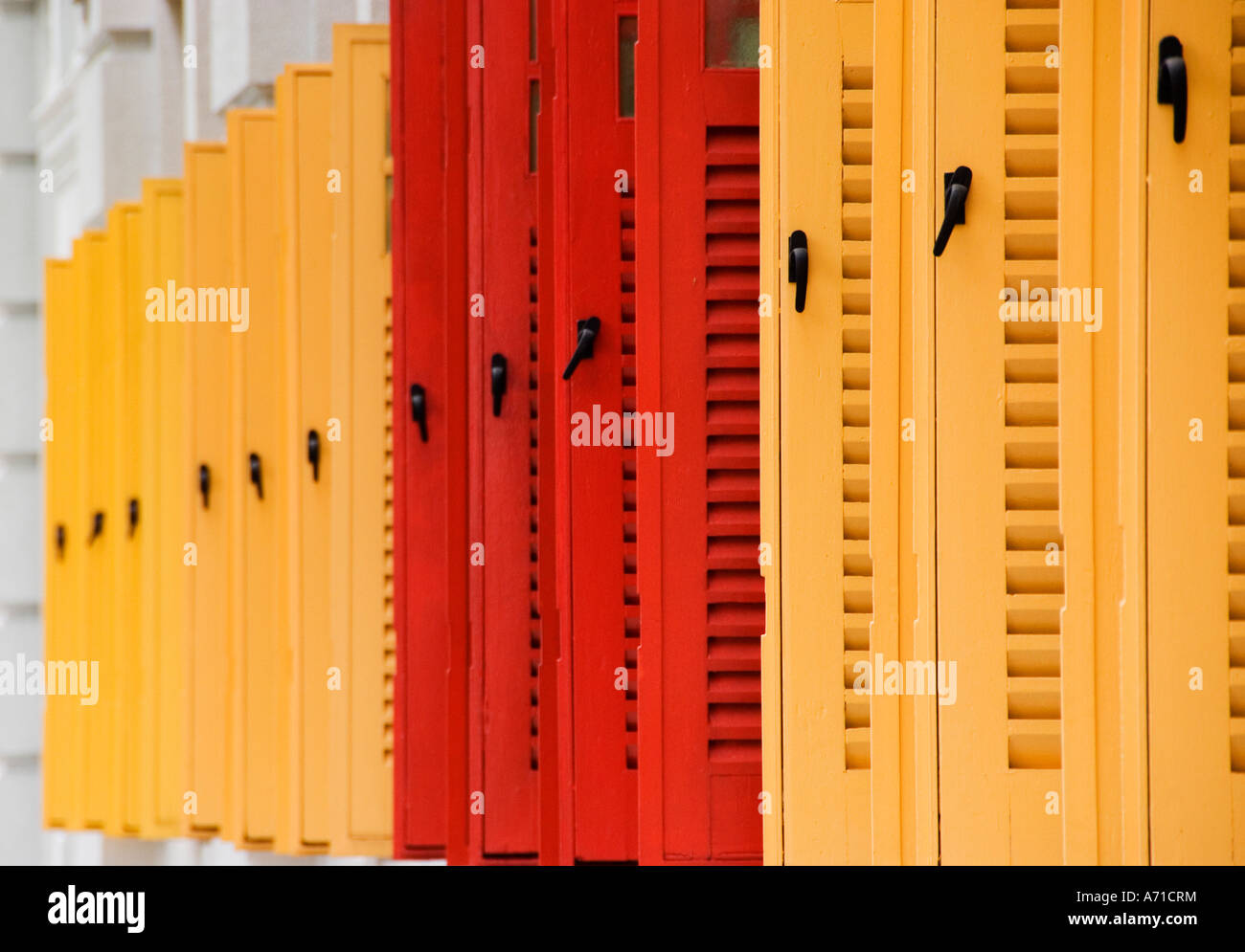 Colourful shutters on the Mica Building Singapore Stock Photo - Alamy