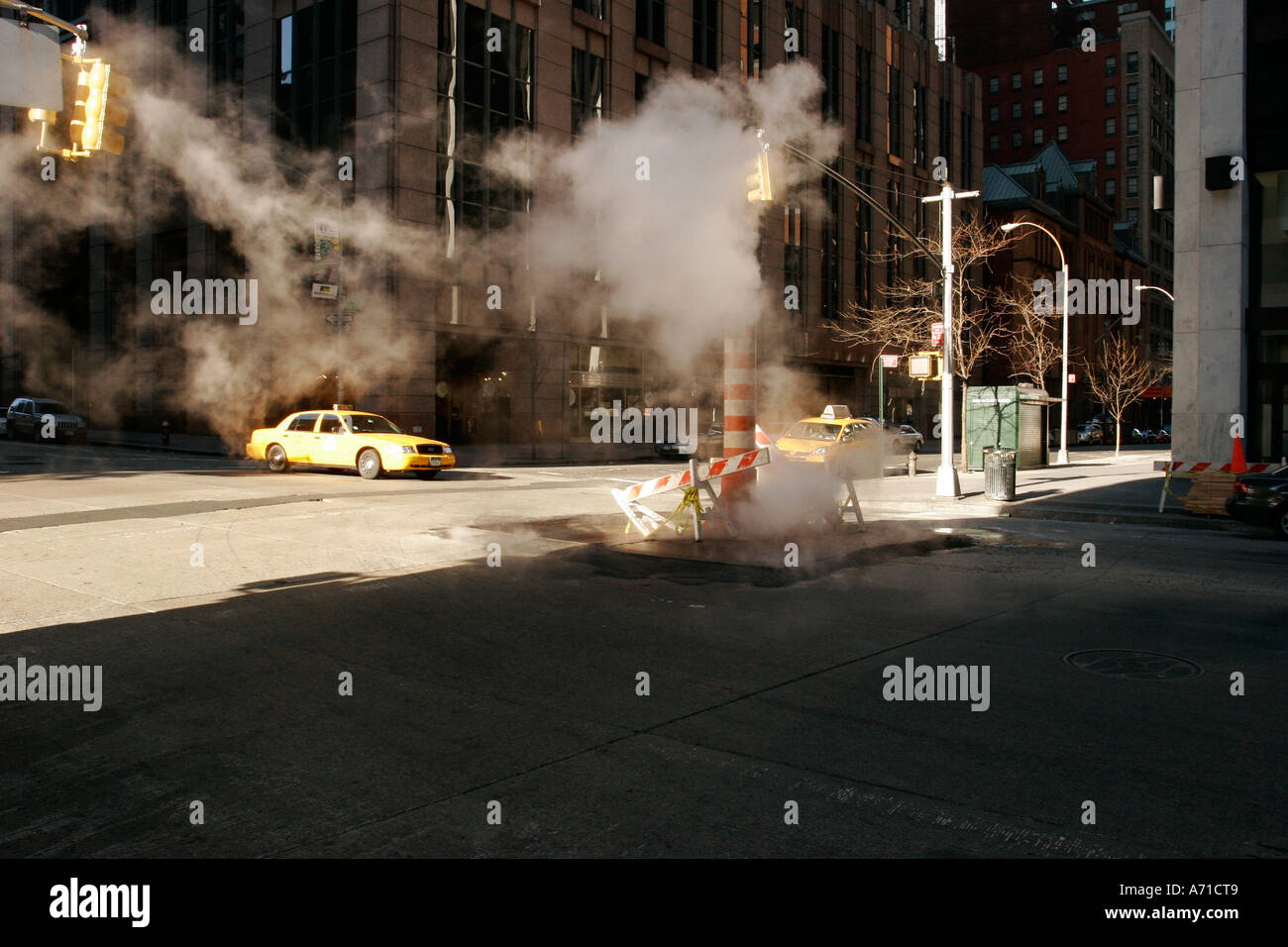 Steam escaping into the New York city street, Manhattan, New York ...