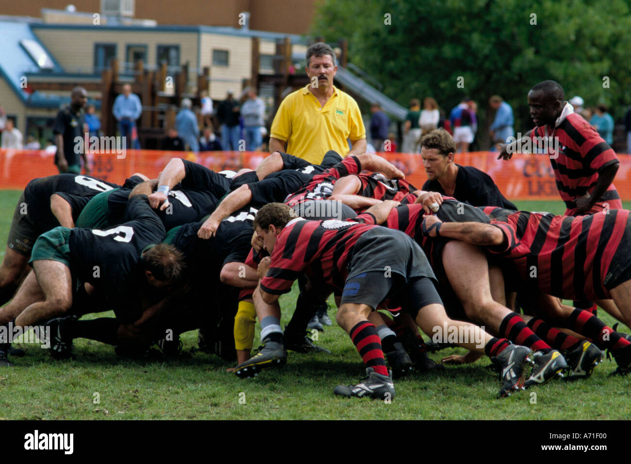 Teamwork in action rugby scrum hi-res stock photography and images - Alamy
