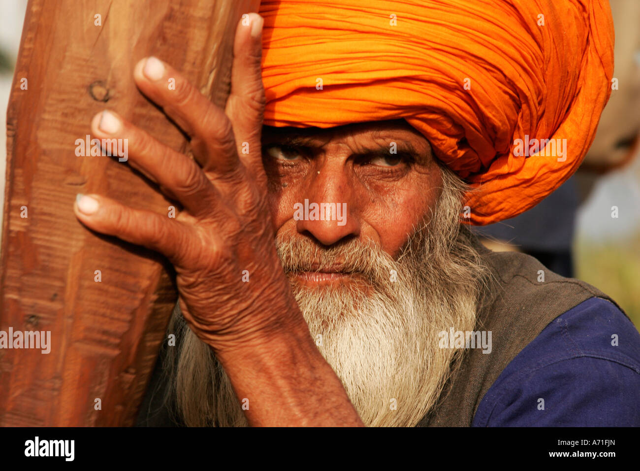 Nihang sitting at his base smiling during Baisakhi festival in Anand ...