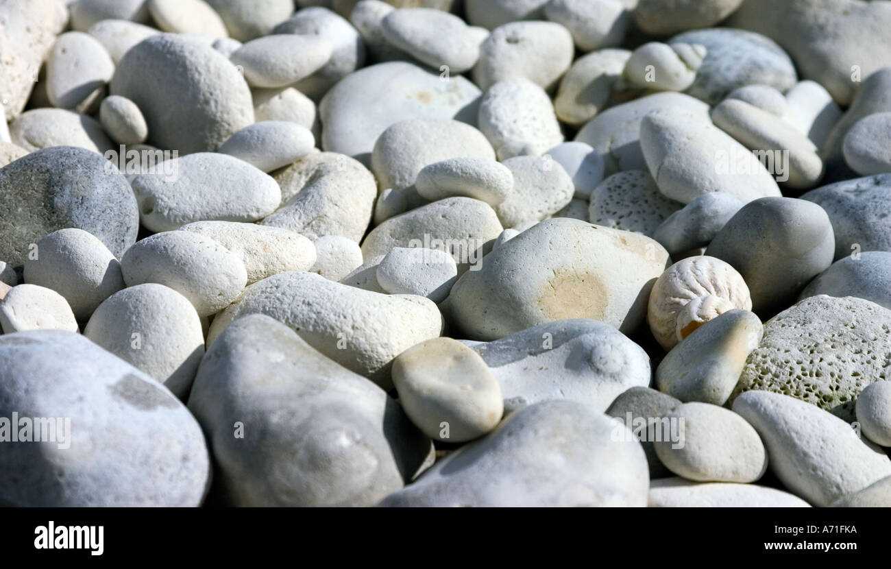 Full bleed shot of white pebbles shot on a British beach Stock Photo ...