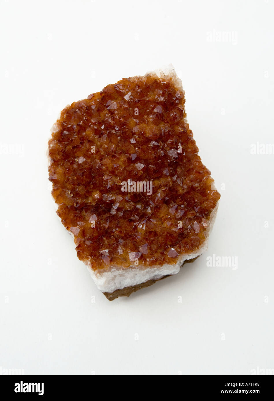 Citrine crystal on a white background Stock Photo - Alamy