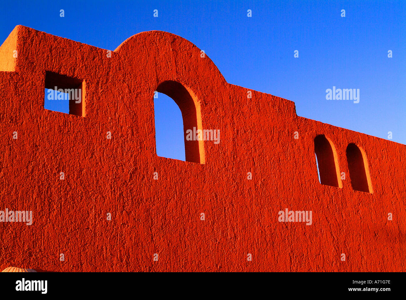 Colored wall of a mexican house in Baja California Stock Photo - Alamy