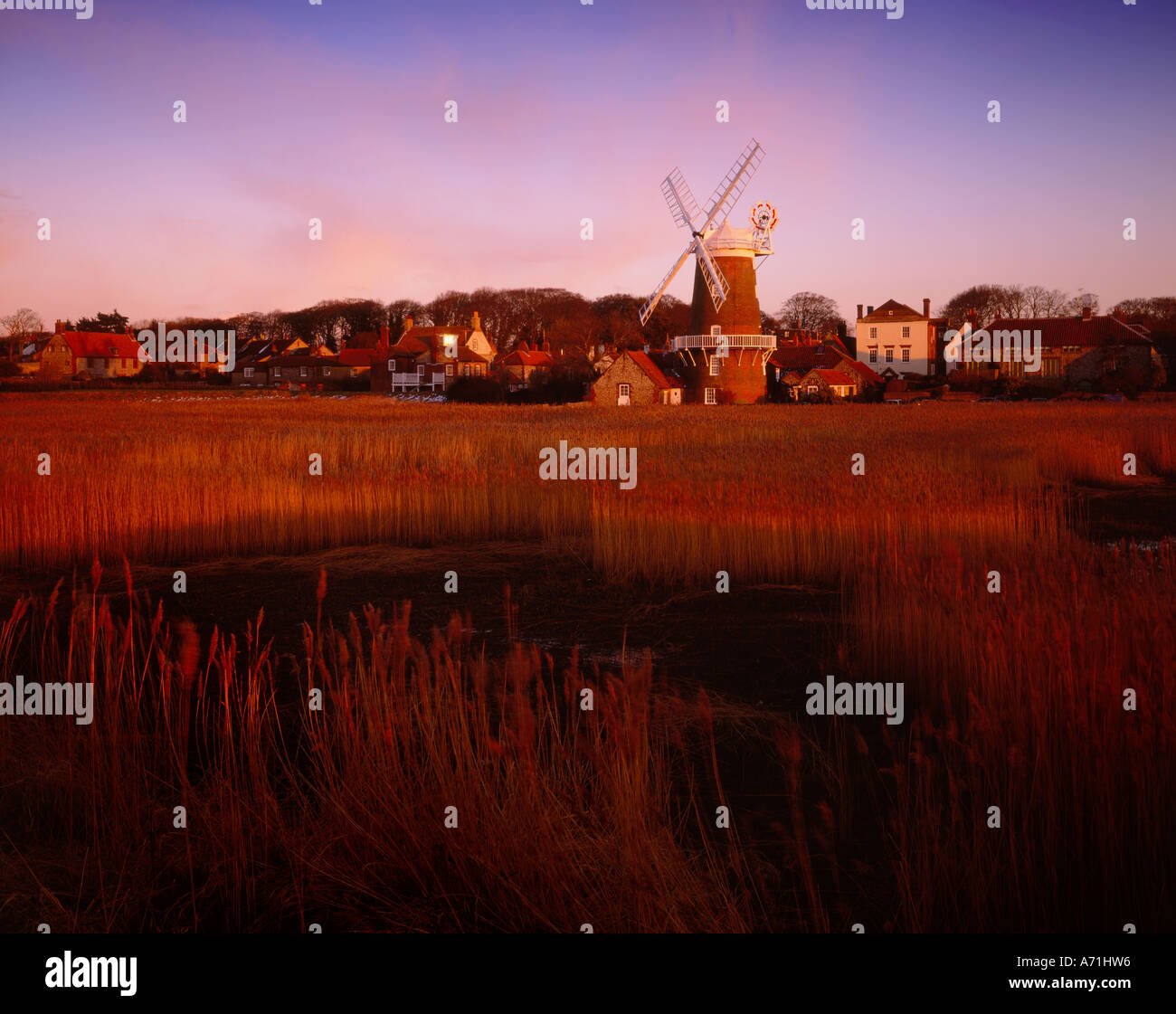 Windmill and saltmarshes at Cley next the sea on north Norfolk coast ...