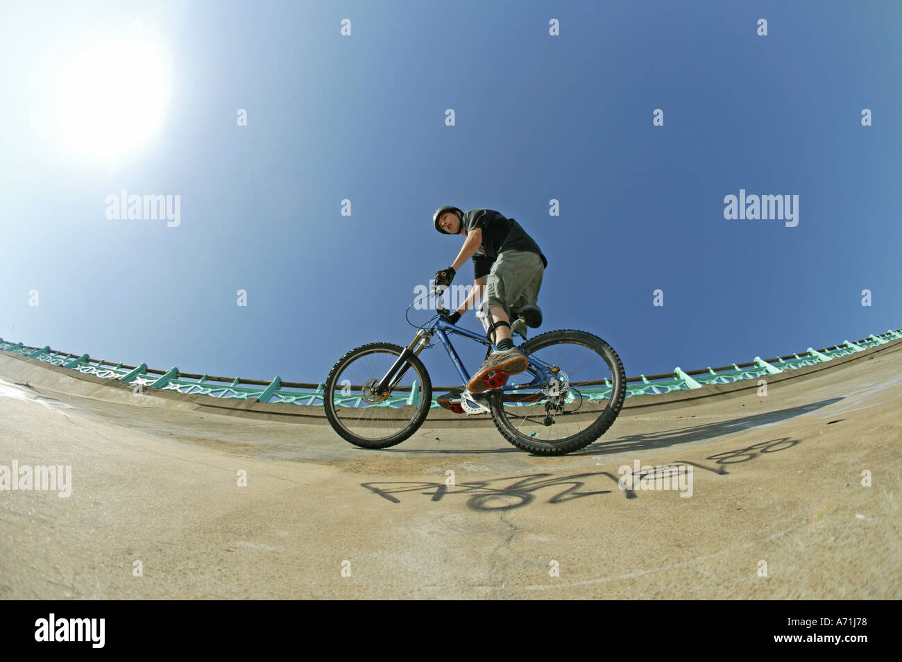 Mountain Biker riding up a wall Stock Photo - Alamy