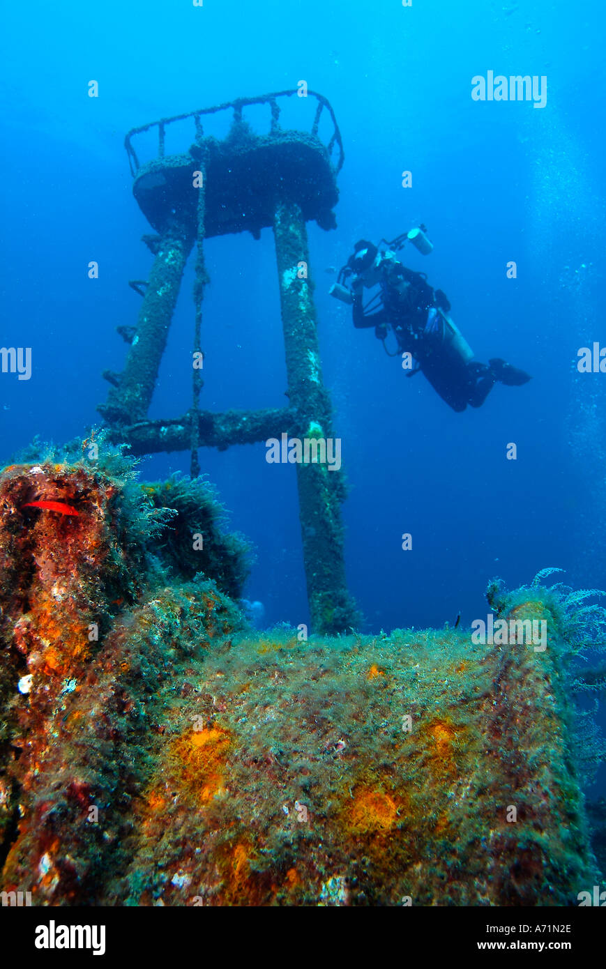 A photographer shooting the Fang Ming wreck Stock Photo - Alamy