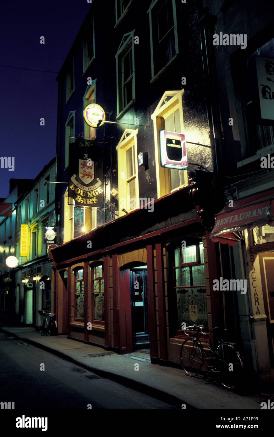Ireland, Cork. Pub at night Stock Photo - Alamy