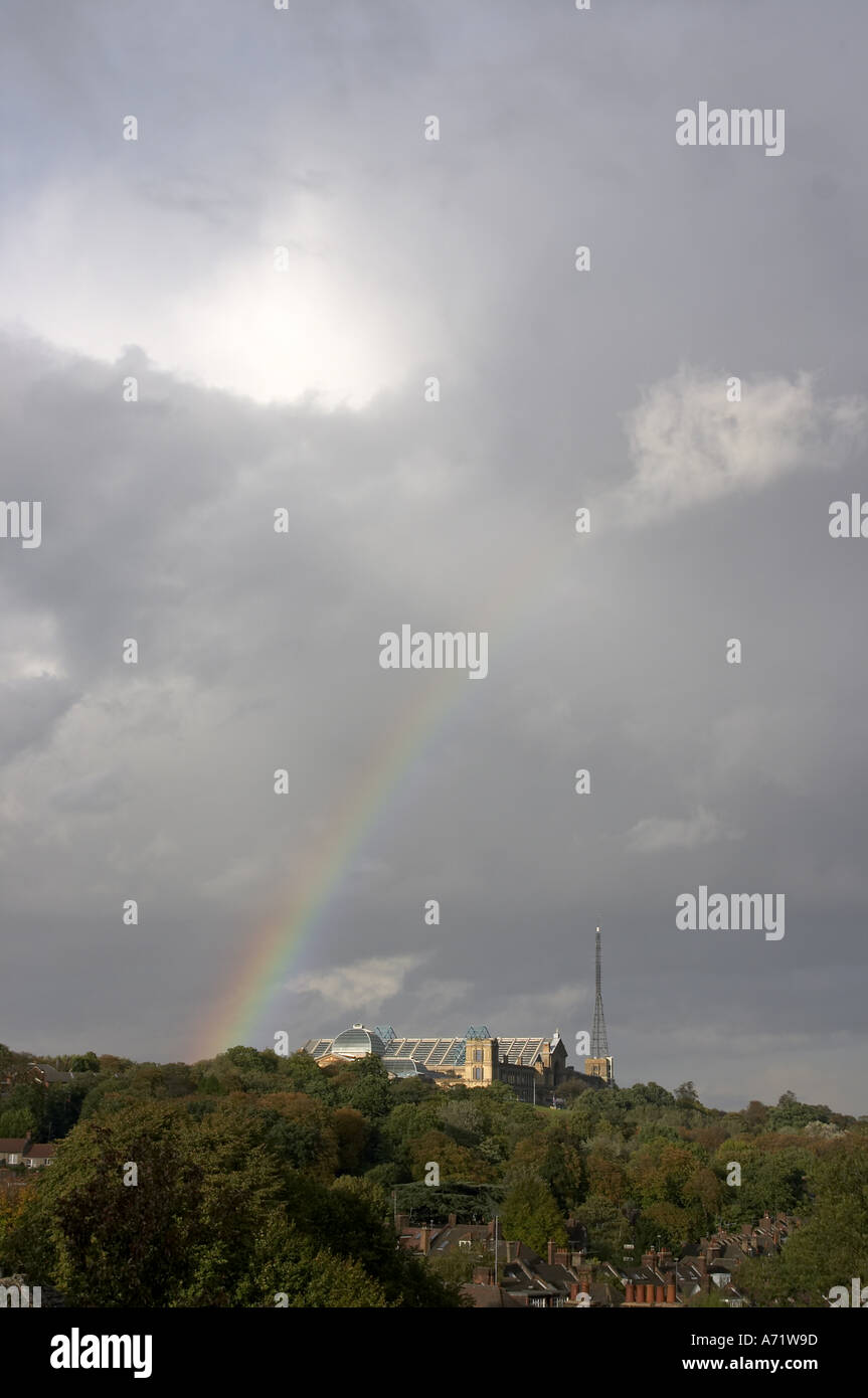 Rainbow over Alexandra Palace and trees plus roof tops of Muswell Hill ...