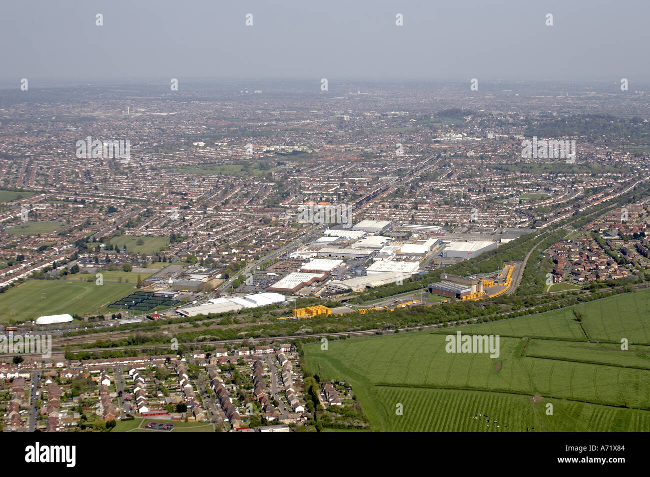 Aerial high level oblique view north east towards Harrow of Queensmead ...