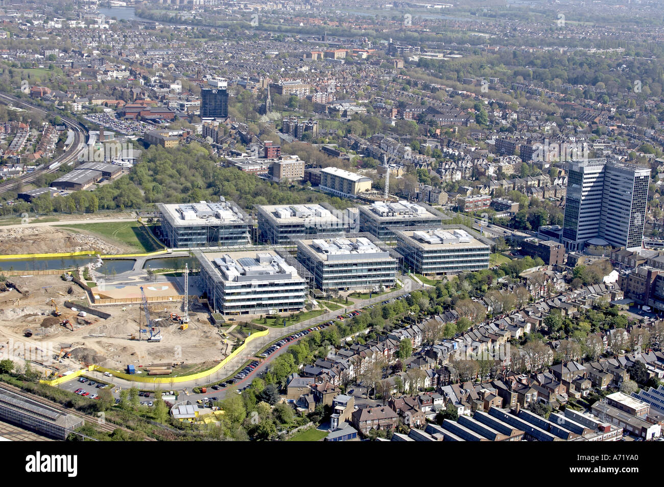 Aerial high level oblique view of south east Chiswick Park Office ...