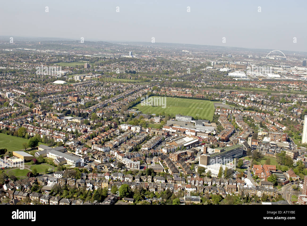 Aerial high level oblique view north west of Gunnersbury and Acton ...