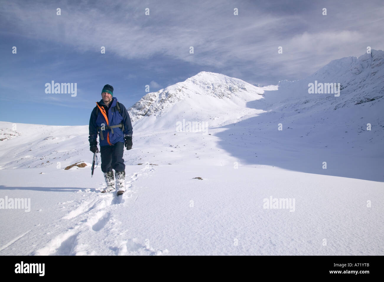 hill walker walking out of the Cuillin ridge, Isle of skye, Scotland ...