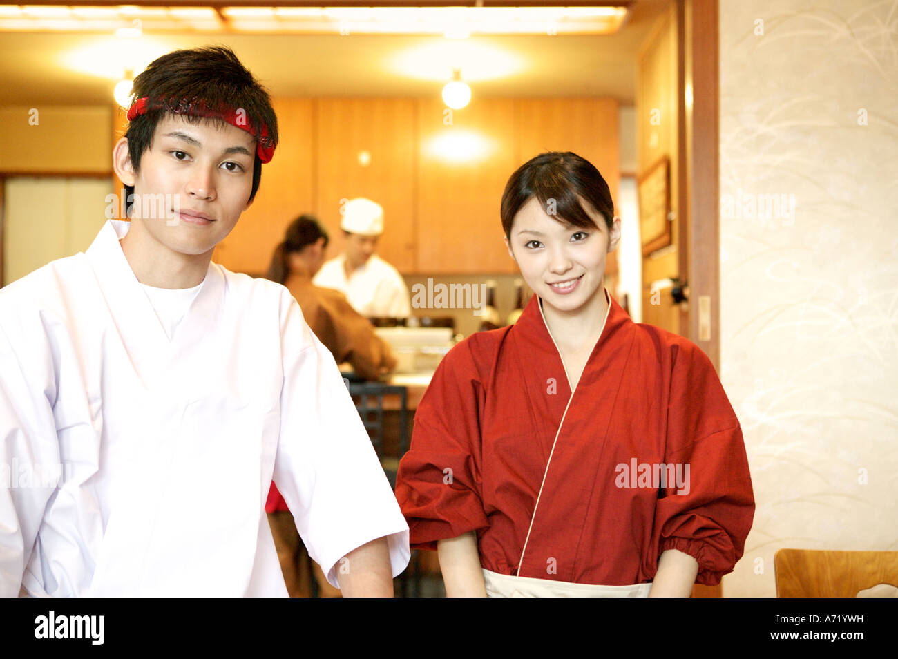 Portrait of waiter and waitress at Japanese restaurant Stock Photo - Alamy