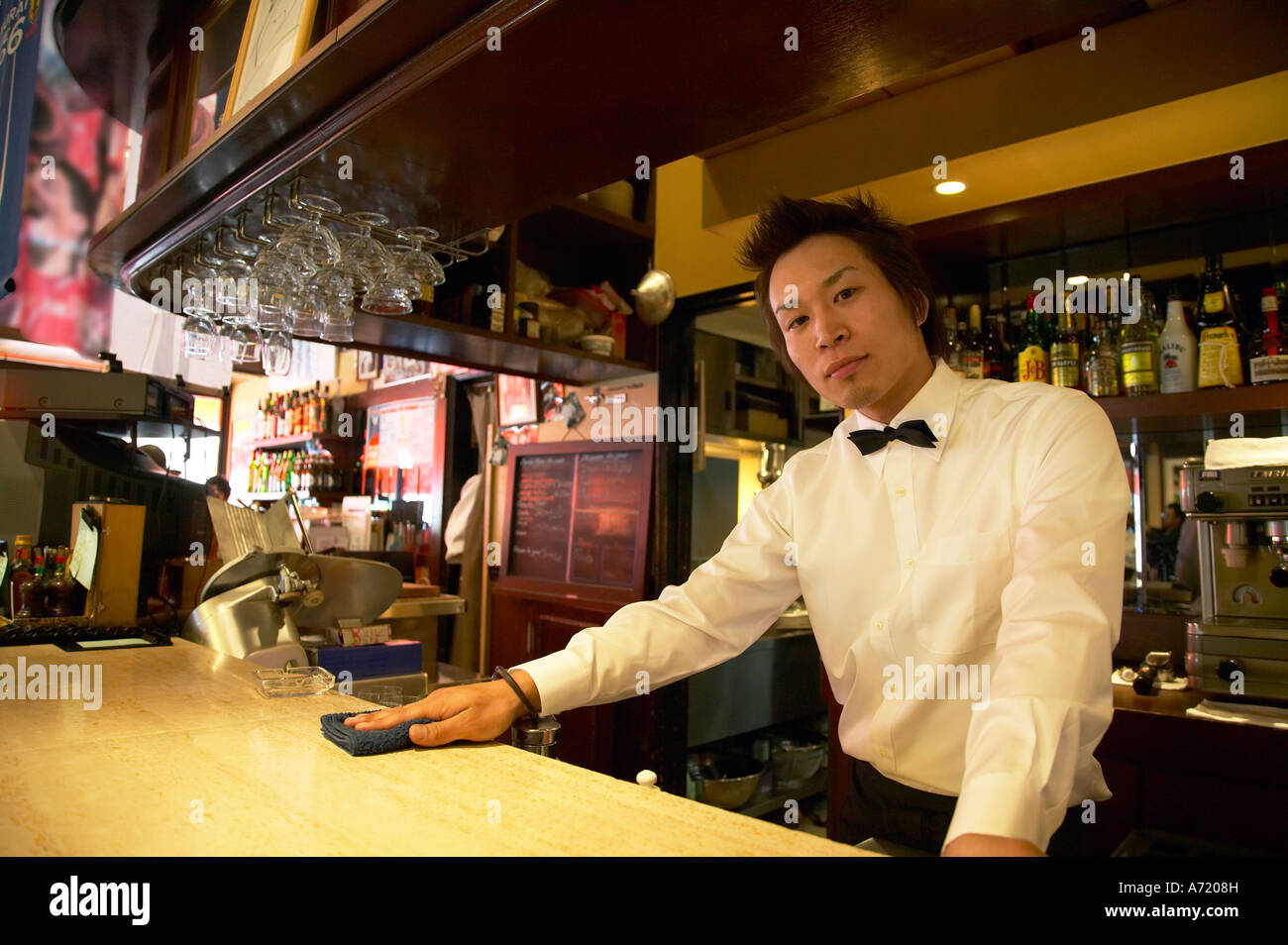 Waiter cleaning bar counter hi-res stock photography and images - Alamy
