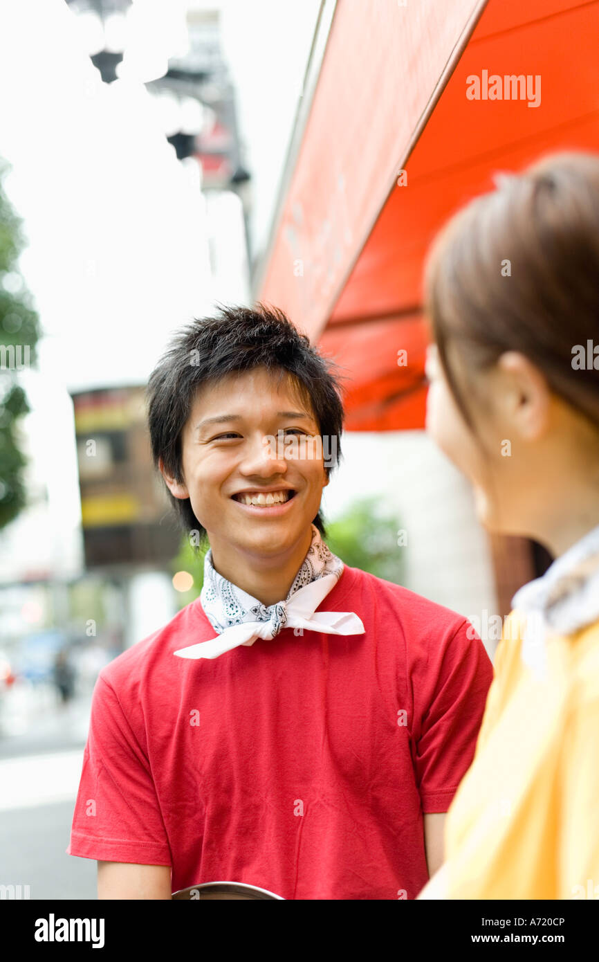 Waiters standing in front of coffee shop Stock Photo - Alamy