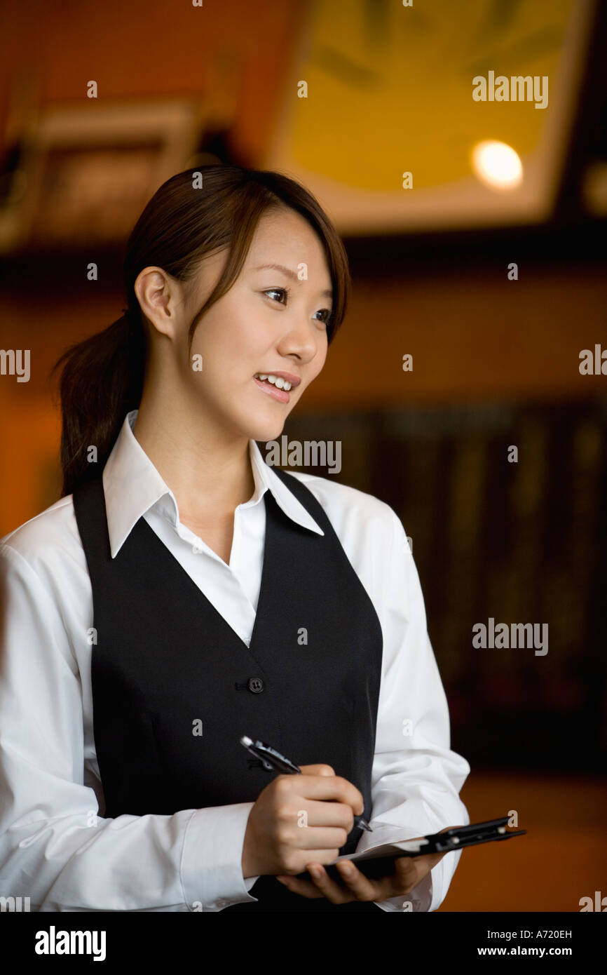 Waitress taking order Stock Photo - Alamy