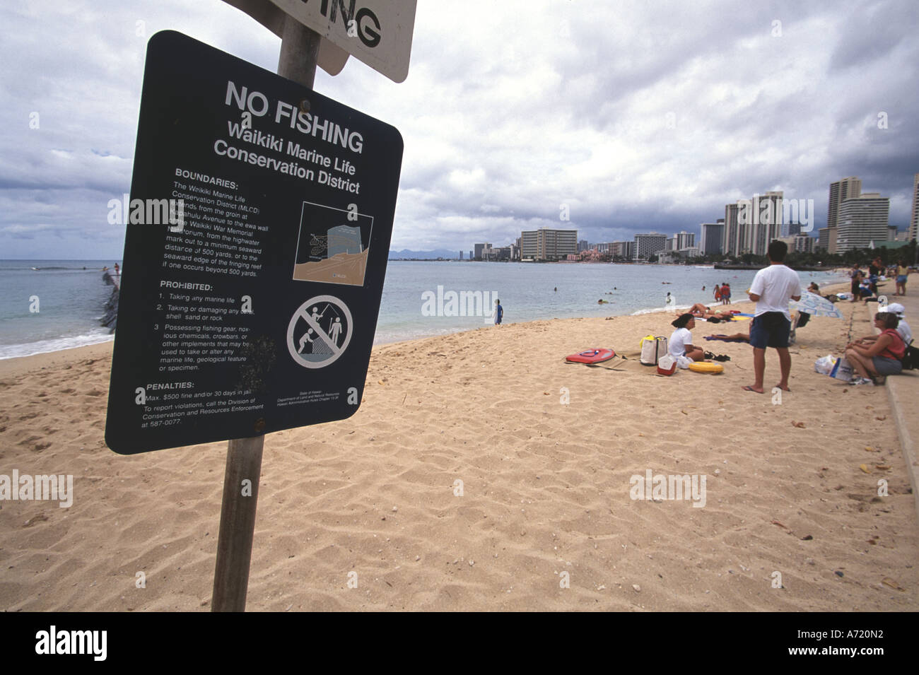 Marine life conservation sign on Waikiki Beach Oahu Hawaii Stock Photo ...