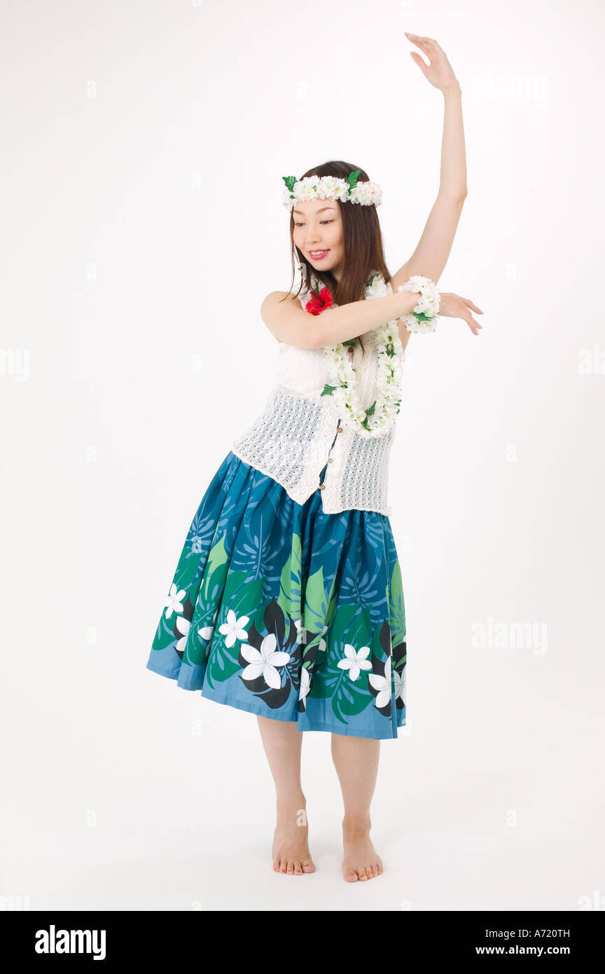Young woman dancing the hula Stock Photo - Alamy