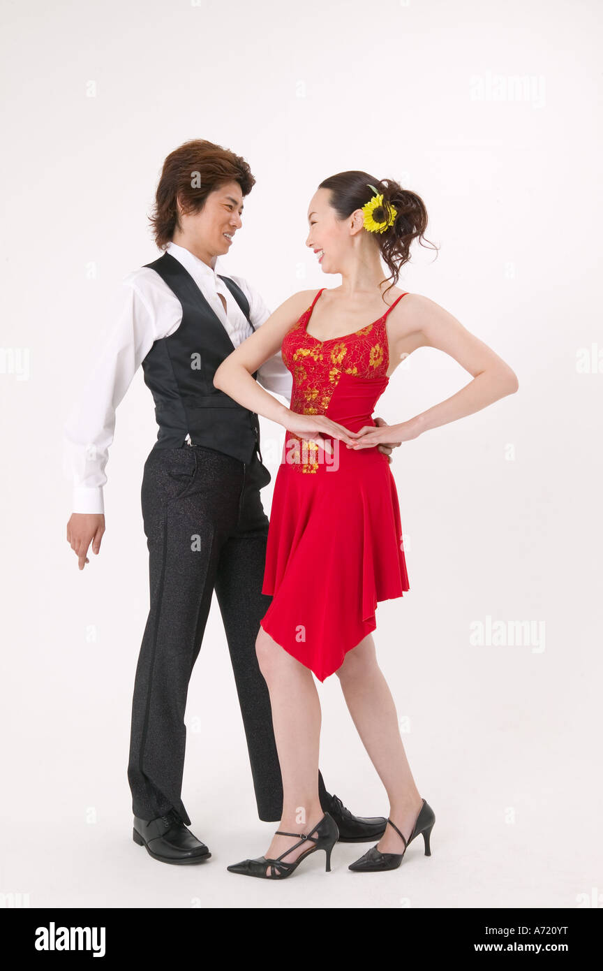 Young couple dancing salsa Stock Photo - Alamy