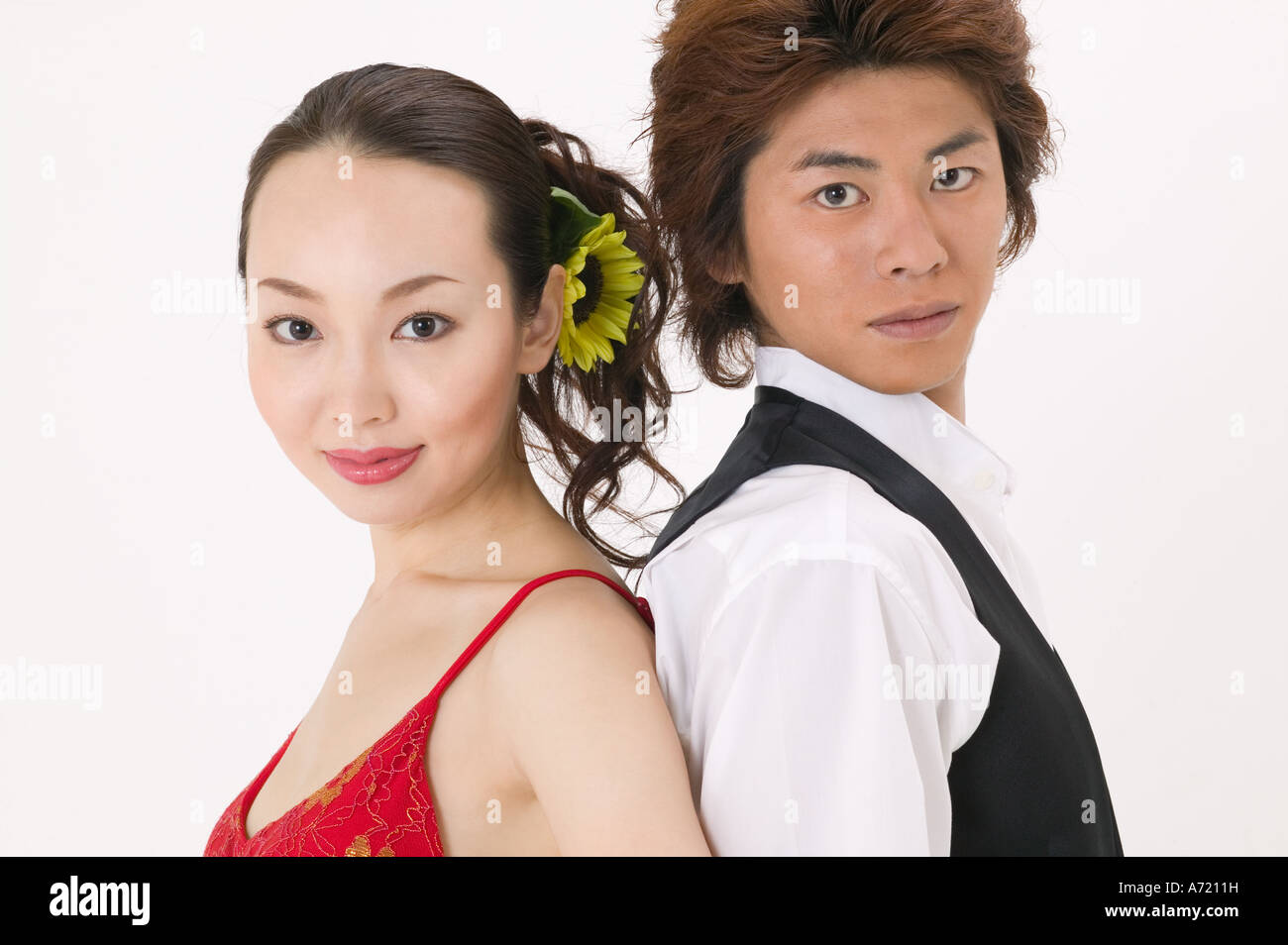 Young couple dancing salsa Stock Photo - Alamy