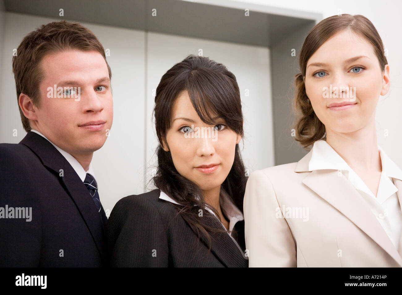 Three business people Stock Photo - Alamy