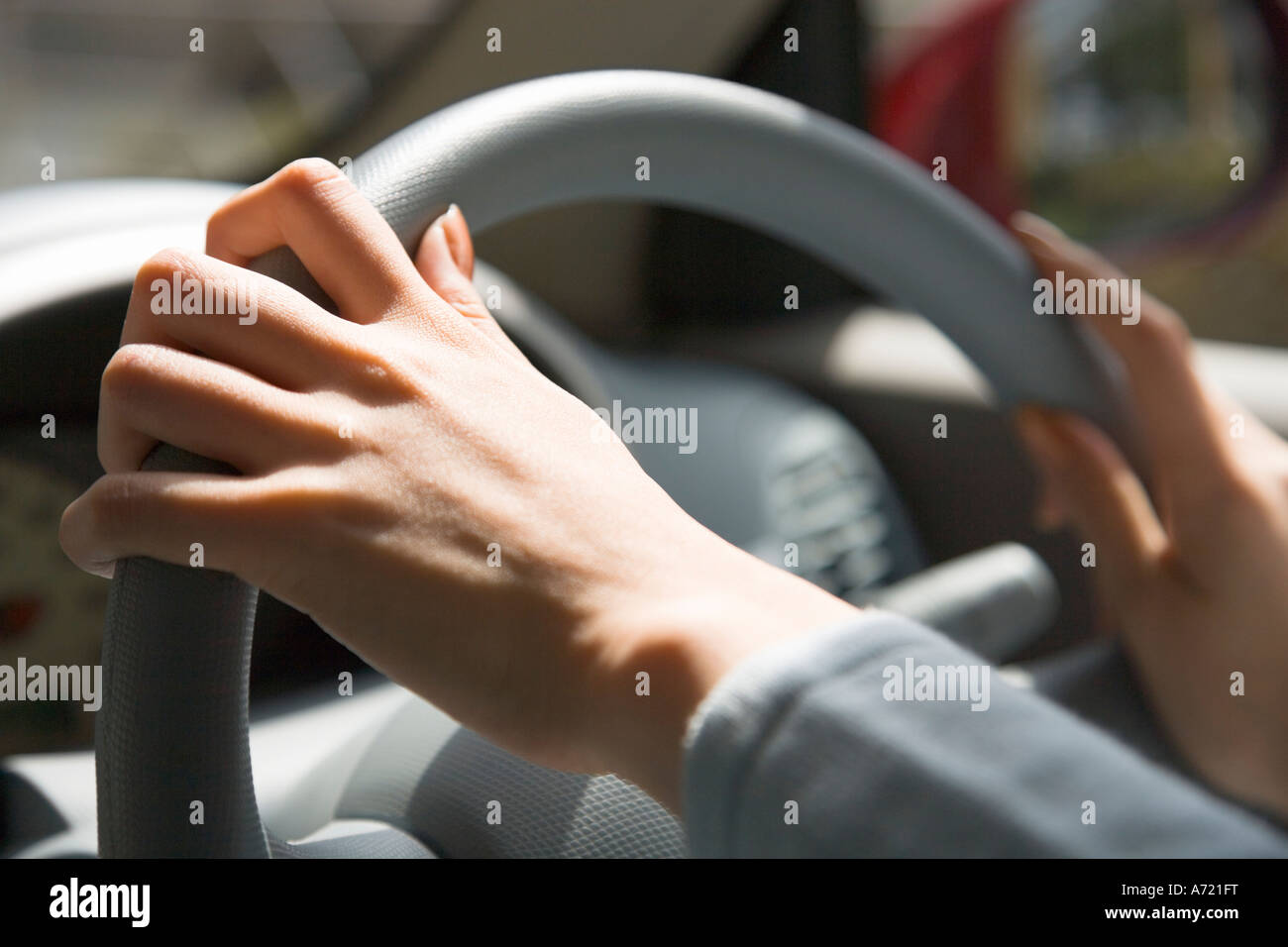 Woman's hand on steering wheel hi-res stock photography and images - Alamy