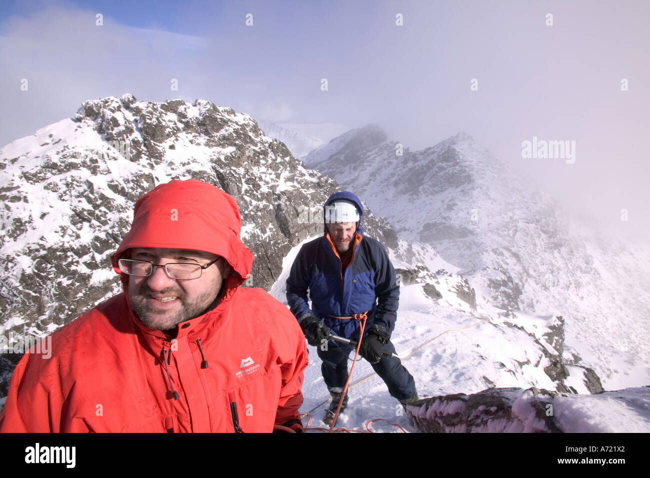 a climber on Sgurr Alasdair, Cuillin Ridge, in full winter conditions ...