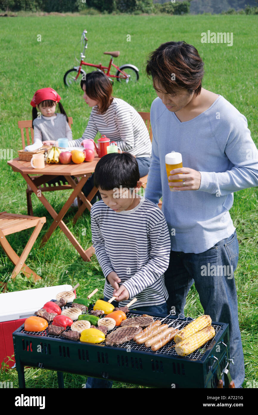 Family barbeque generation hi-res stock photography and images - Alamy