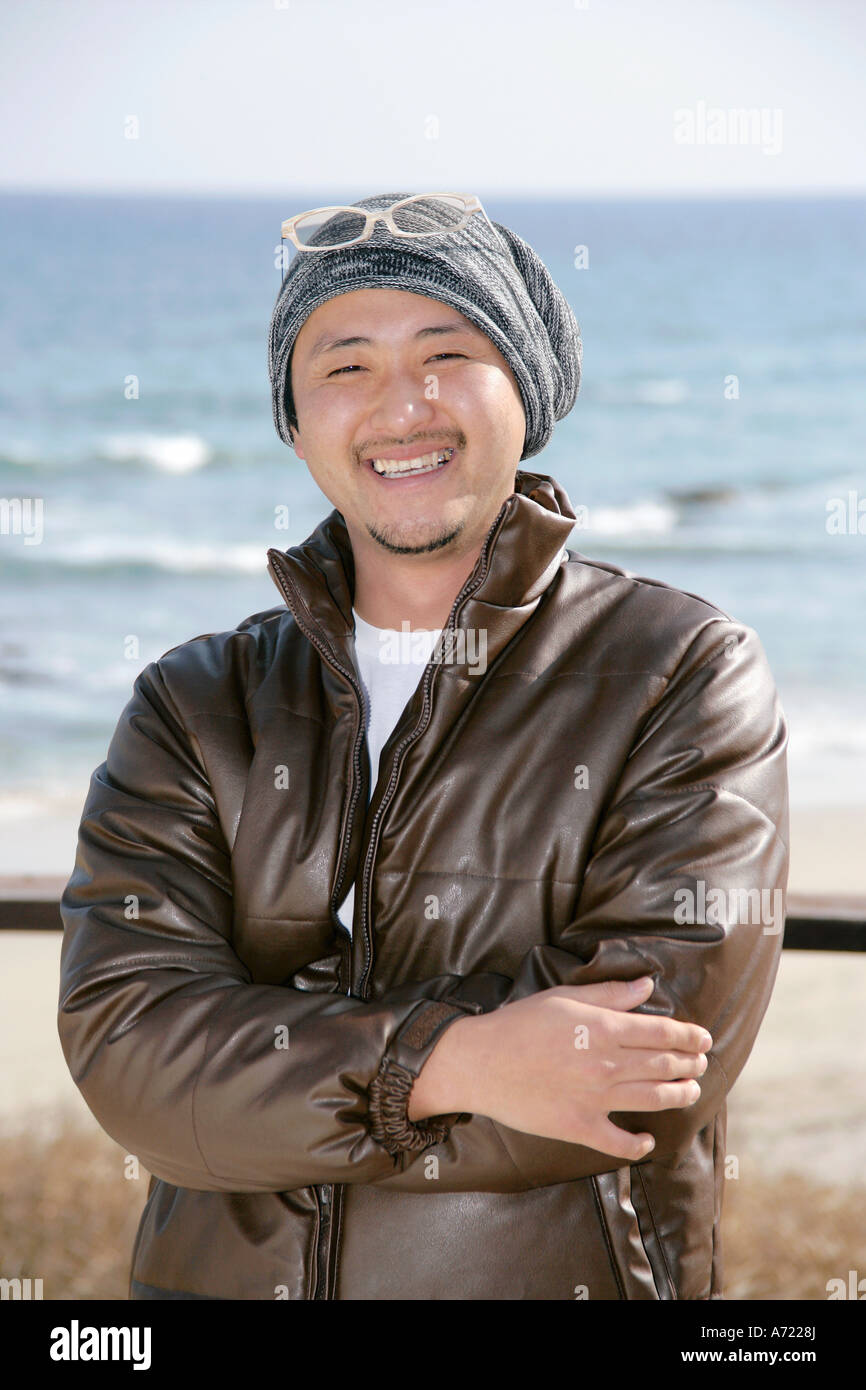 Man smiling to camera Stock Photo - Alamy