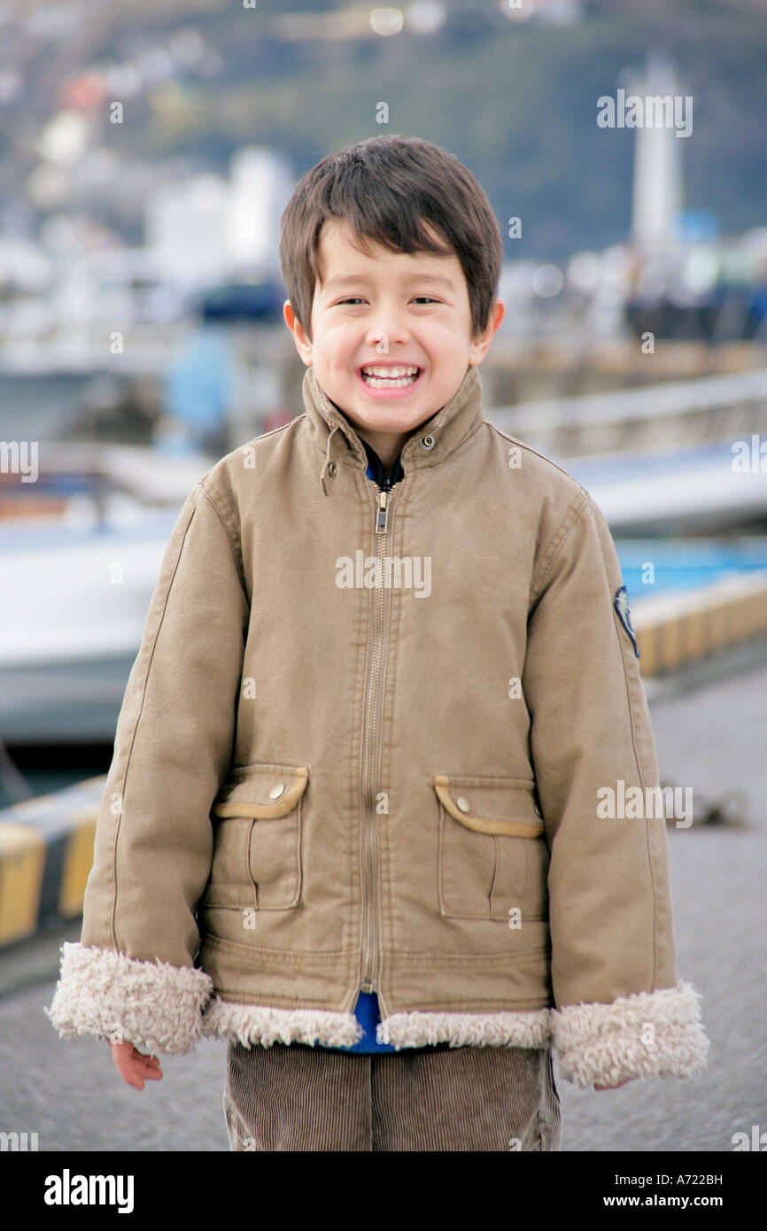 Portrait of a boy standing Stock Photo - Alamy