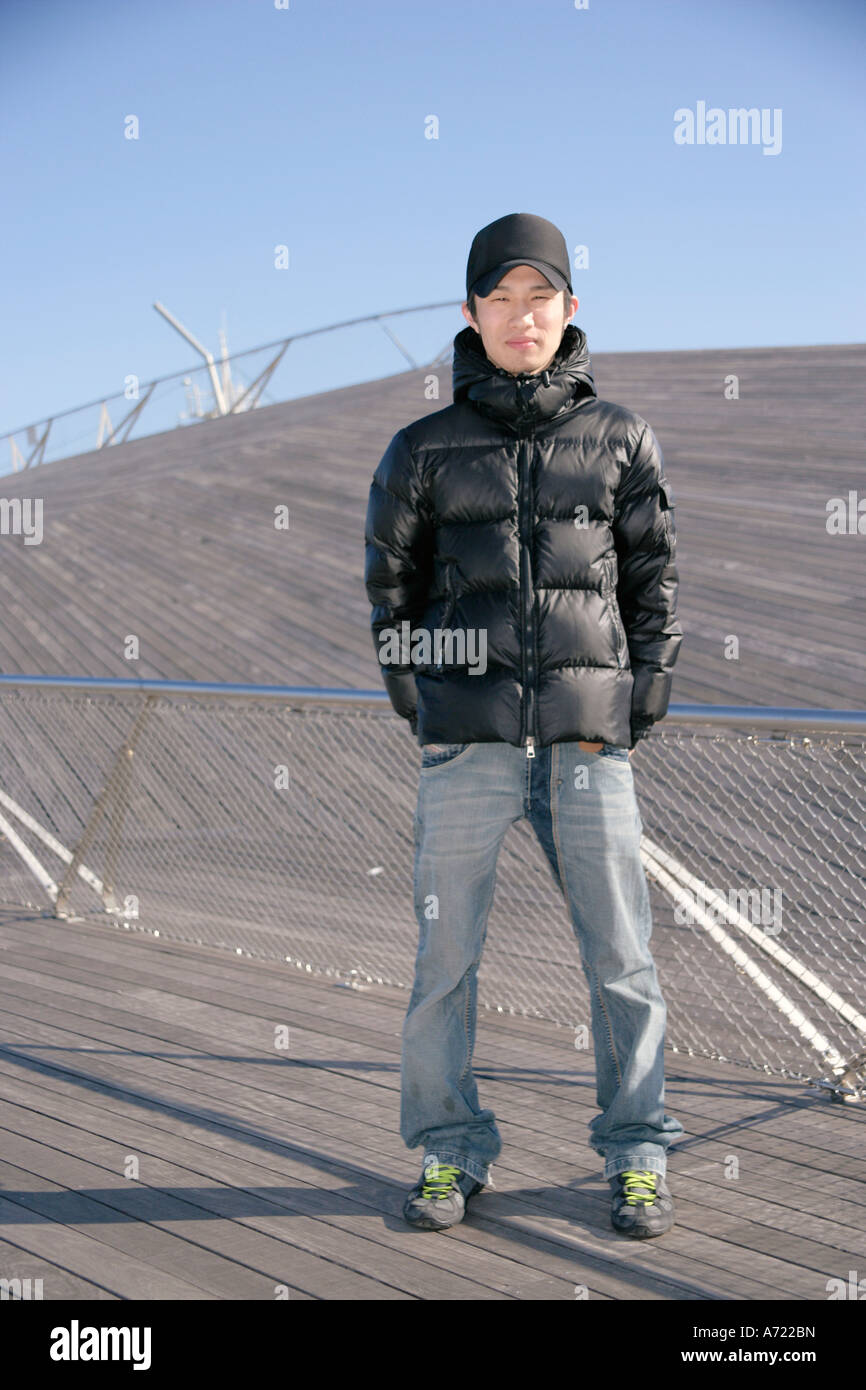 Portrait of a young man standing Stock Photo - Alamy