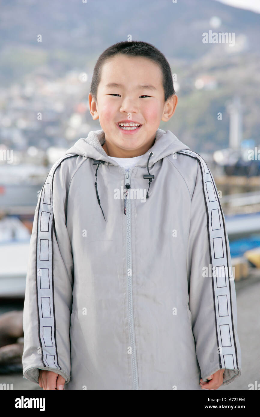 Portrait of a boy standing Stock Photo - Alamy