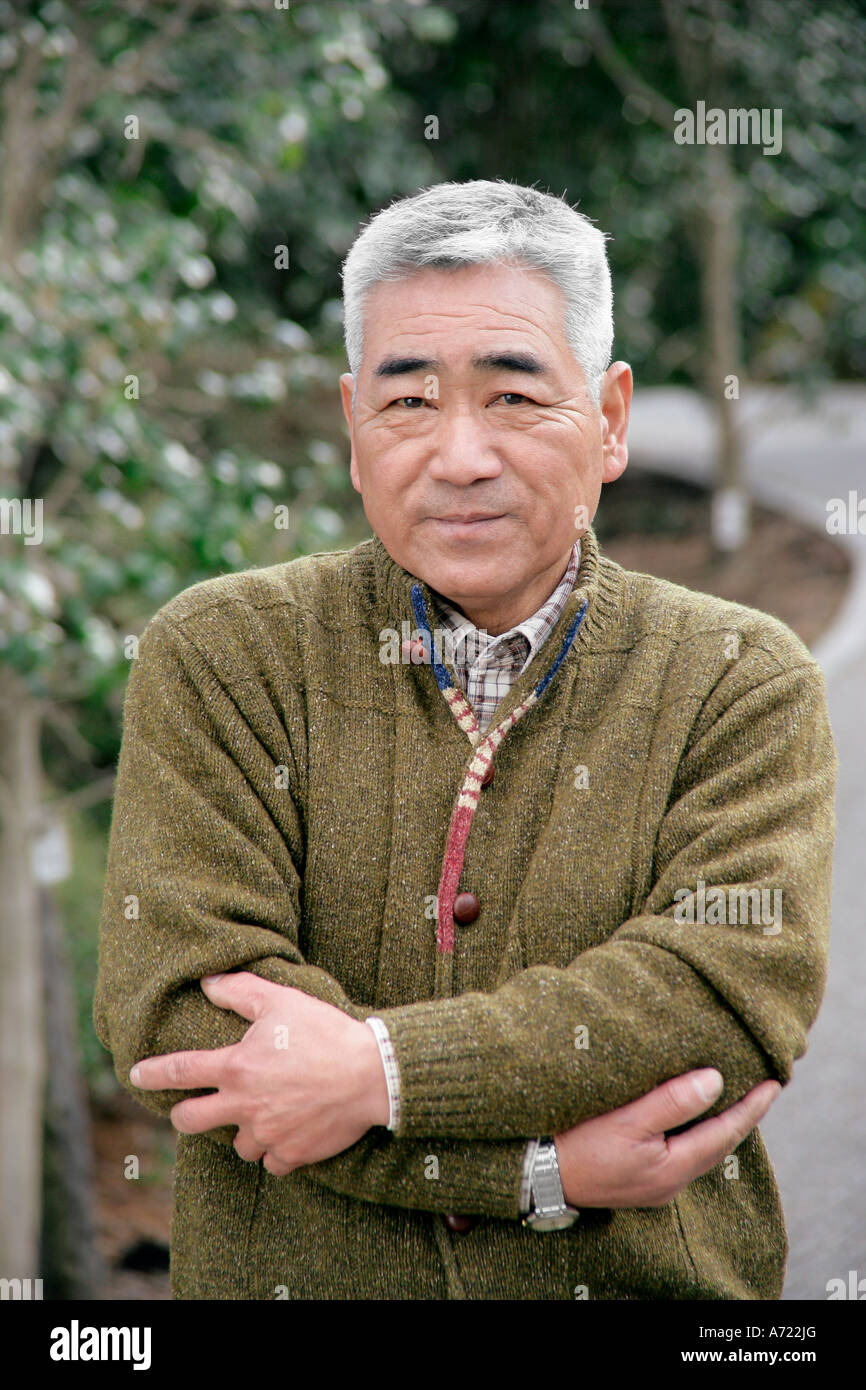 Portrait of a senior man standing Stock Photo - Alamy