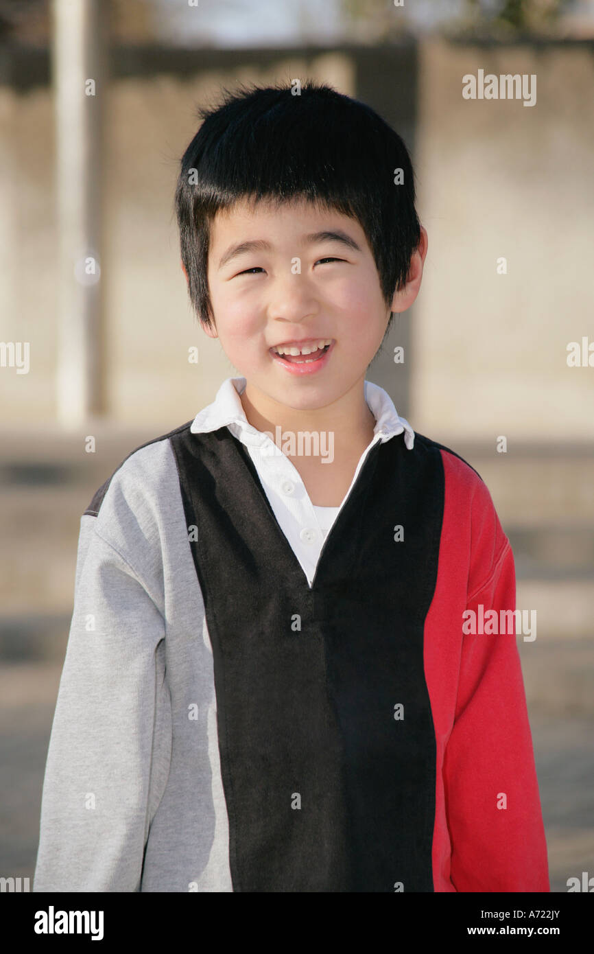 Portrait of a boy standing Stock Photo - Alamy