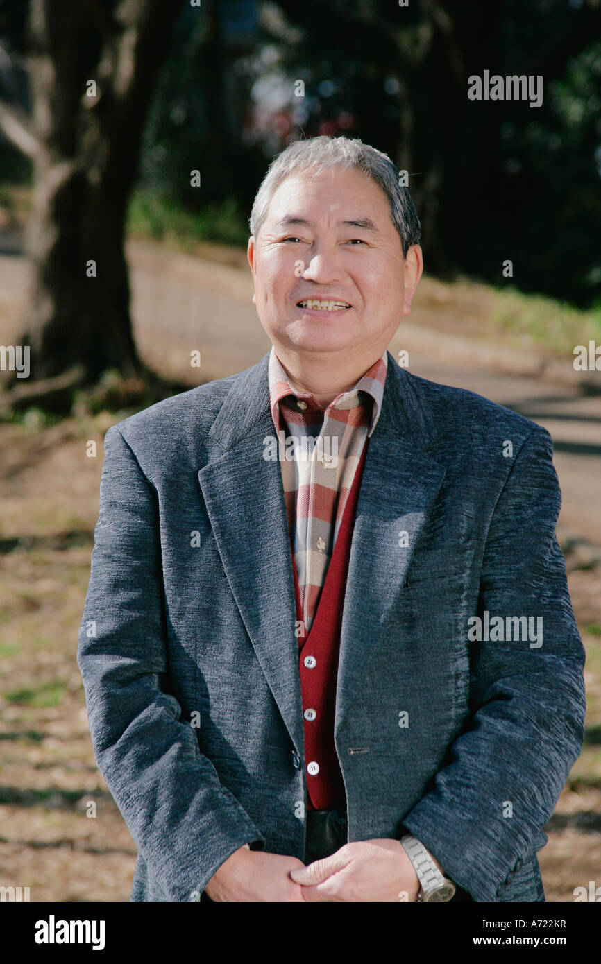 Portrait of a senior man standing Stock Photo - Alamy