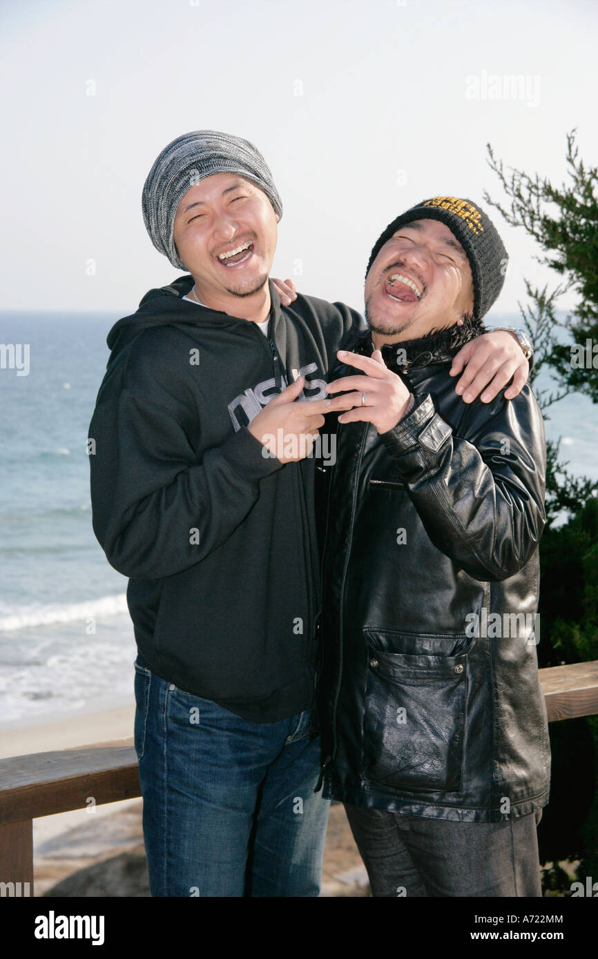 Portrait of two men laughing Stock Photo - Alamy