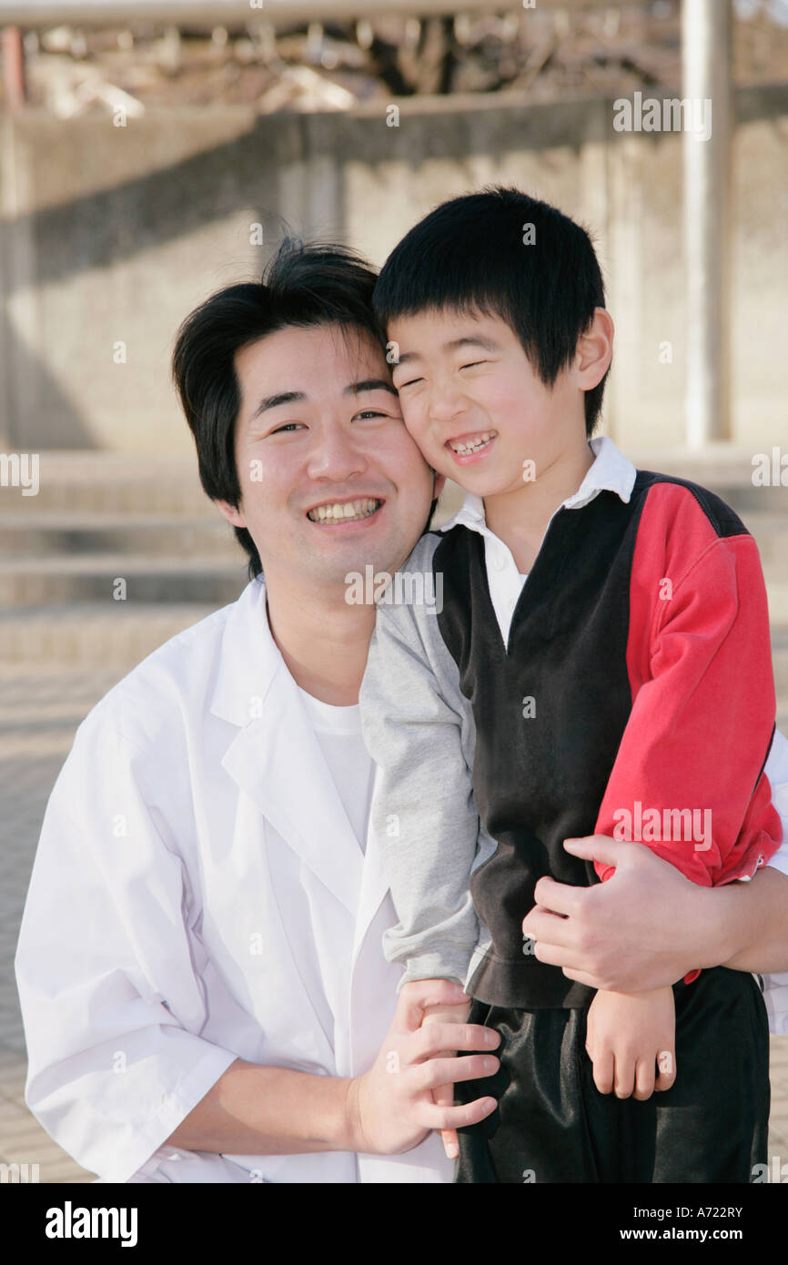 Portrait of father and son Stock Photo - Alamy