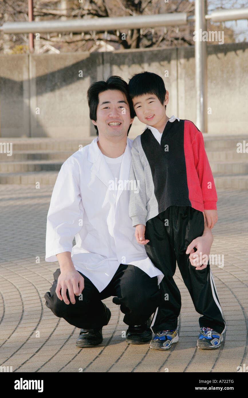 Portrait of father and son Stock Photo - Alamy
