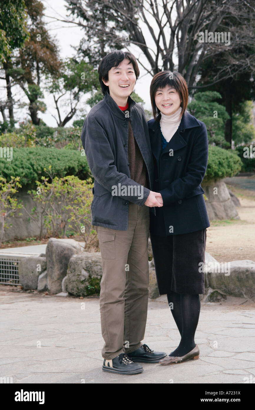 Portrait of mid adult couple Stock Photo - Alamy